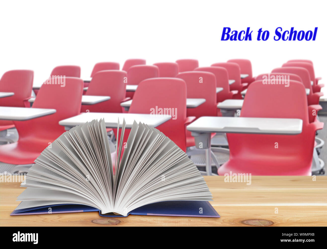 books and back to school concept in an empty classroom against white ...