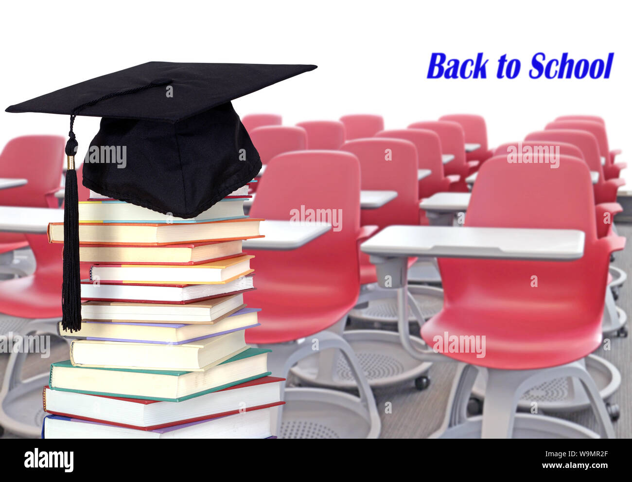 books and back to school concept in an empty classroom against white ...