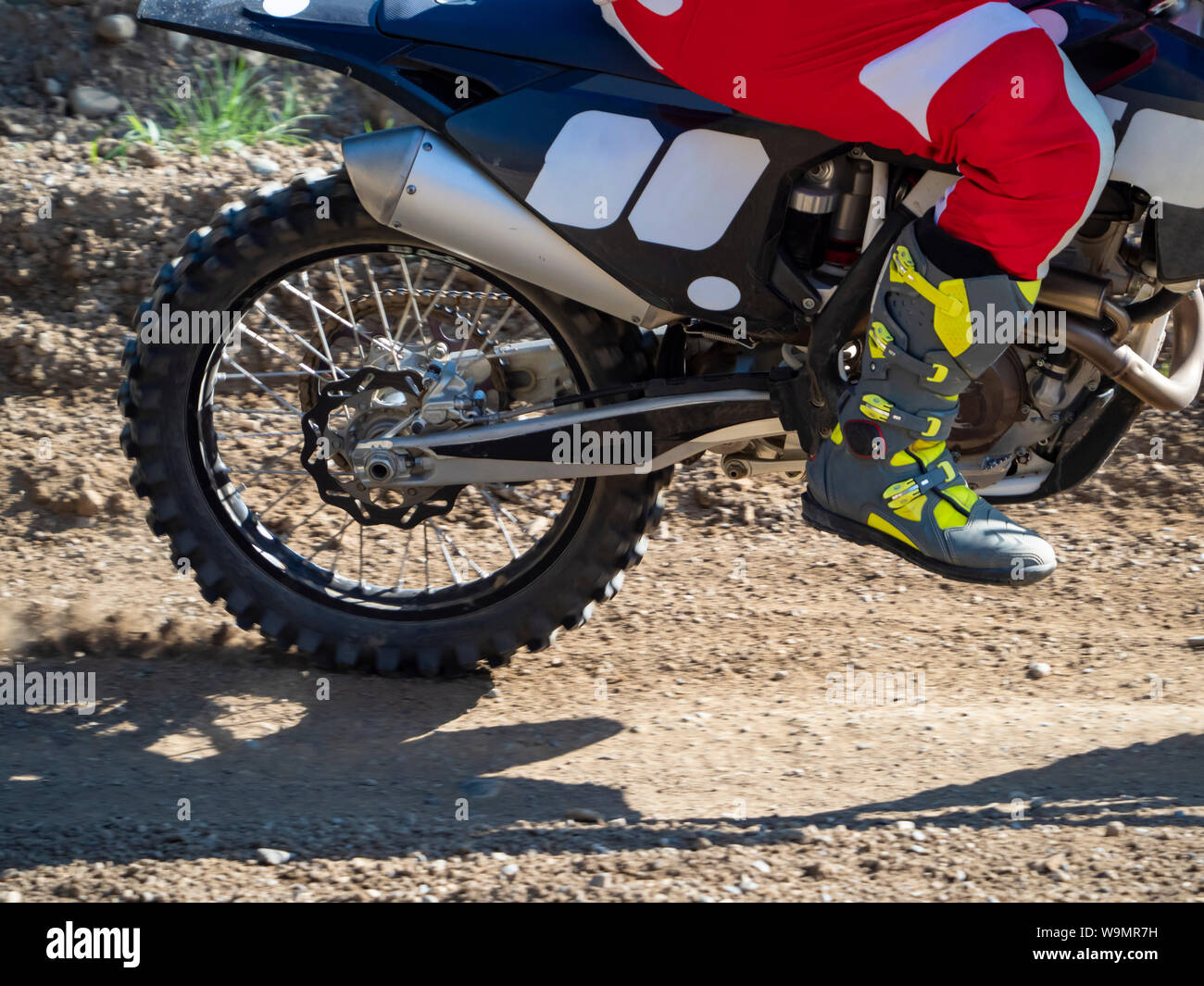 Motocross rider on a trail detail Stock Photo - Alamy