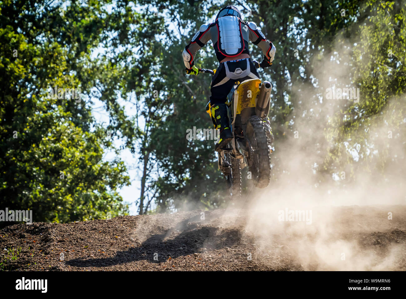 Motocross rider on a trail detail Stock Photo - Alamy
