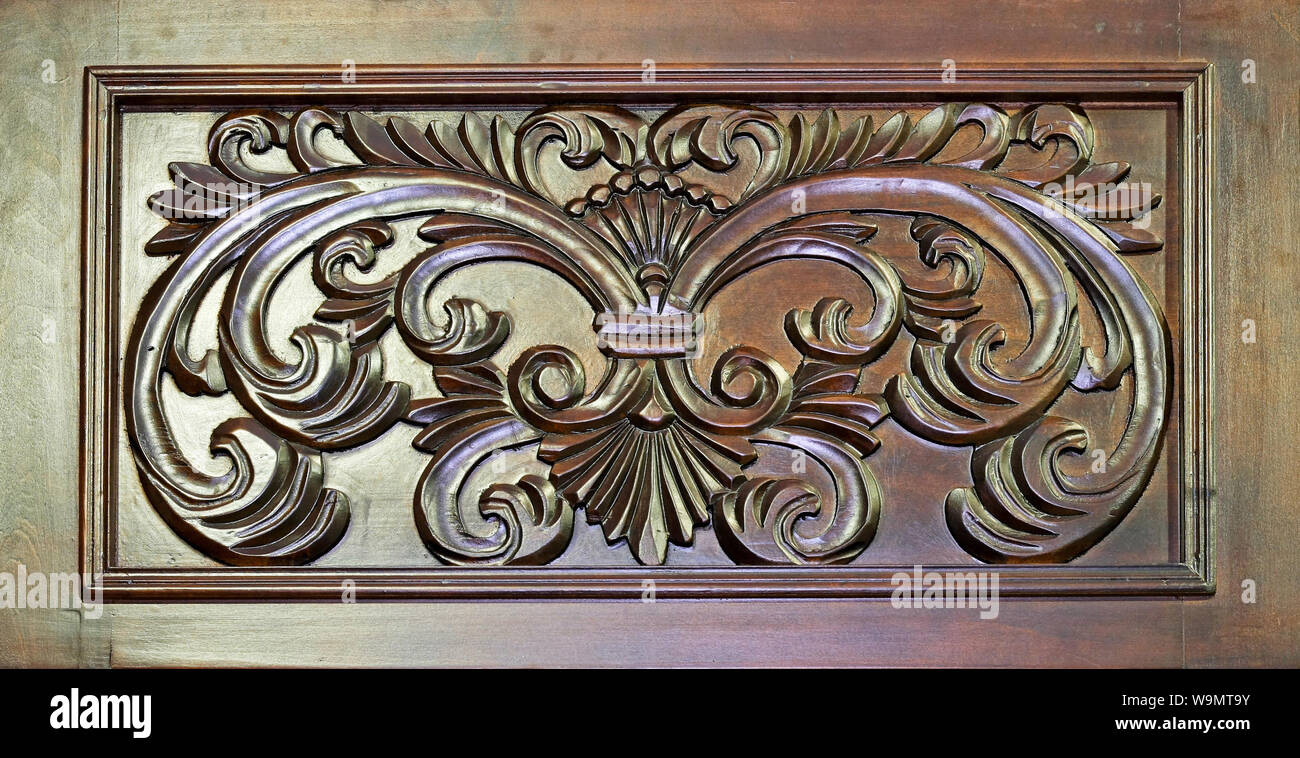 Hand made craft work engraved wood in frame Stock Photo - Alamy