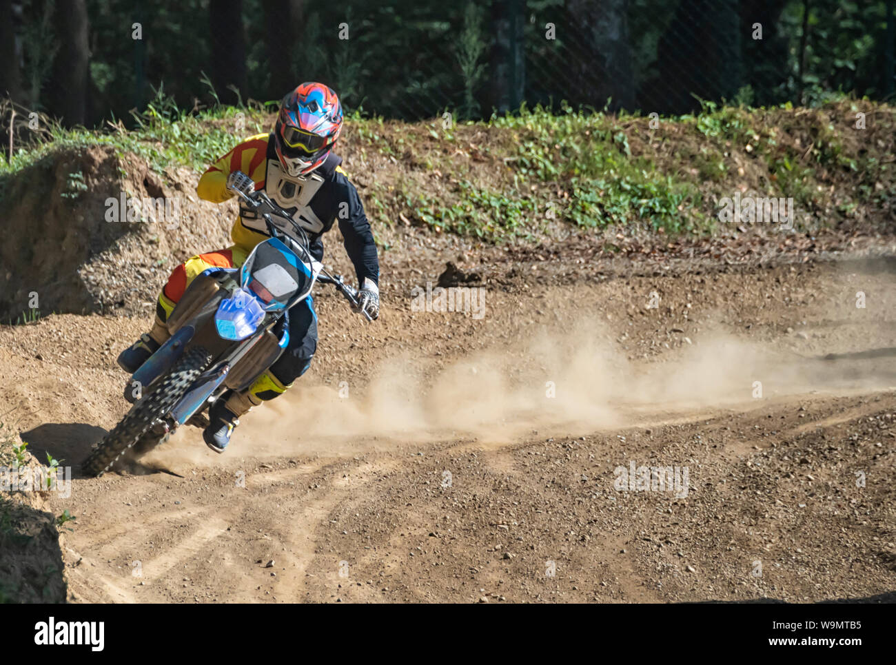 Motocross rider on a trail detail Stock Photo - Alamy