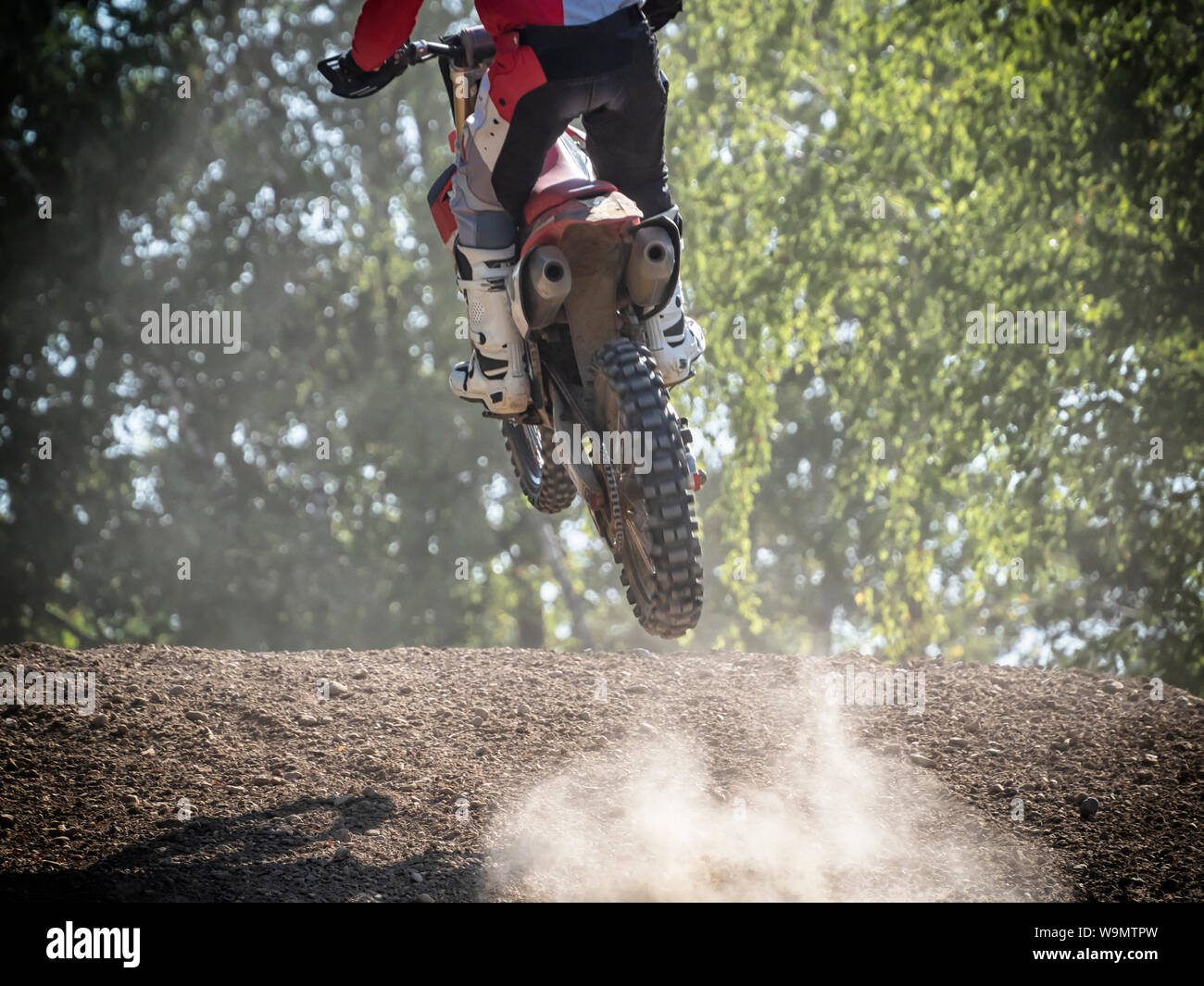 Motocross rider on a trail detail Stock Photo - Alamy