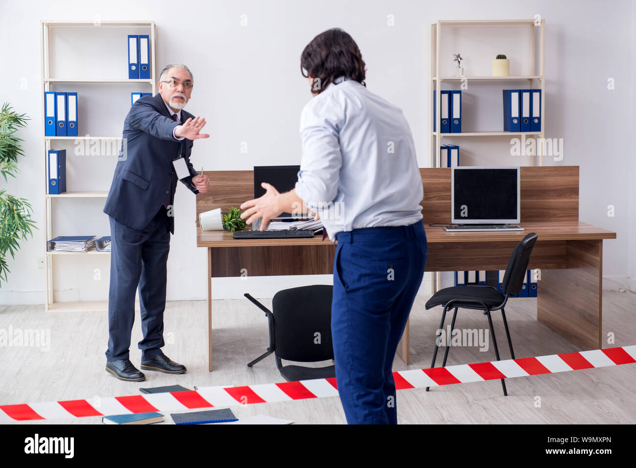 Forensic investigator investigating theft hi-res stock photography and ...