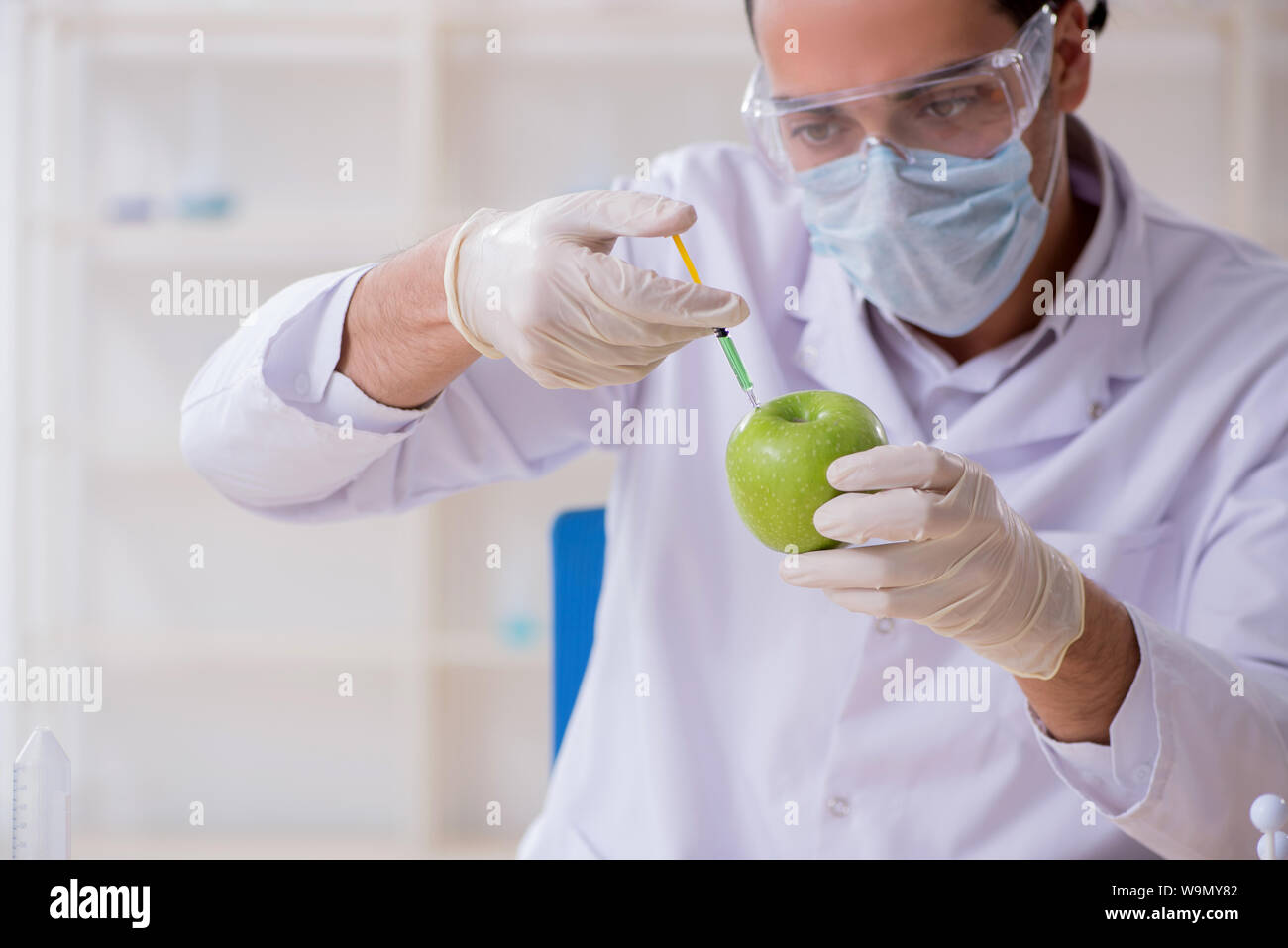 The male nutrition expert testing food products in lab Stock Photo - Alamy
