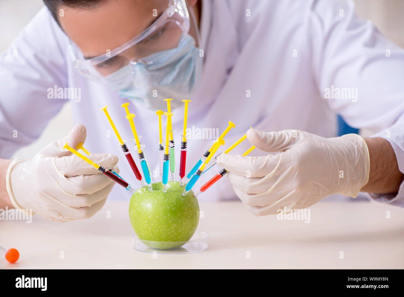 The male nutrition expert testing food products in lab Stock Photo - Alamy