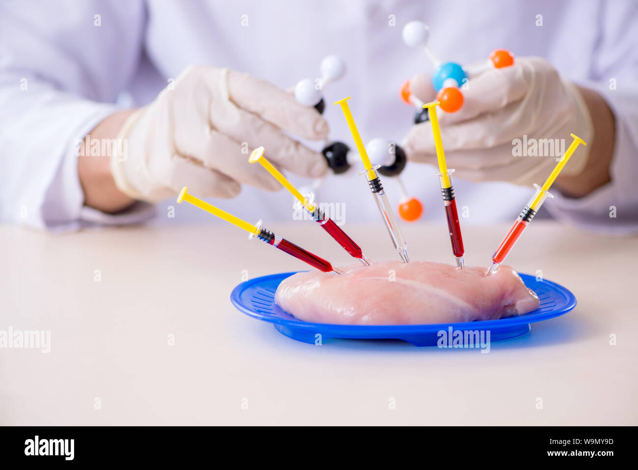 The male nutrition expert testing food products in lab Stock Photo - Alamy