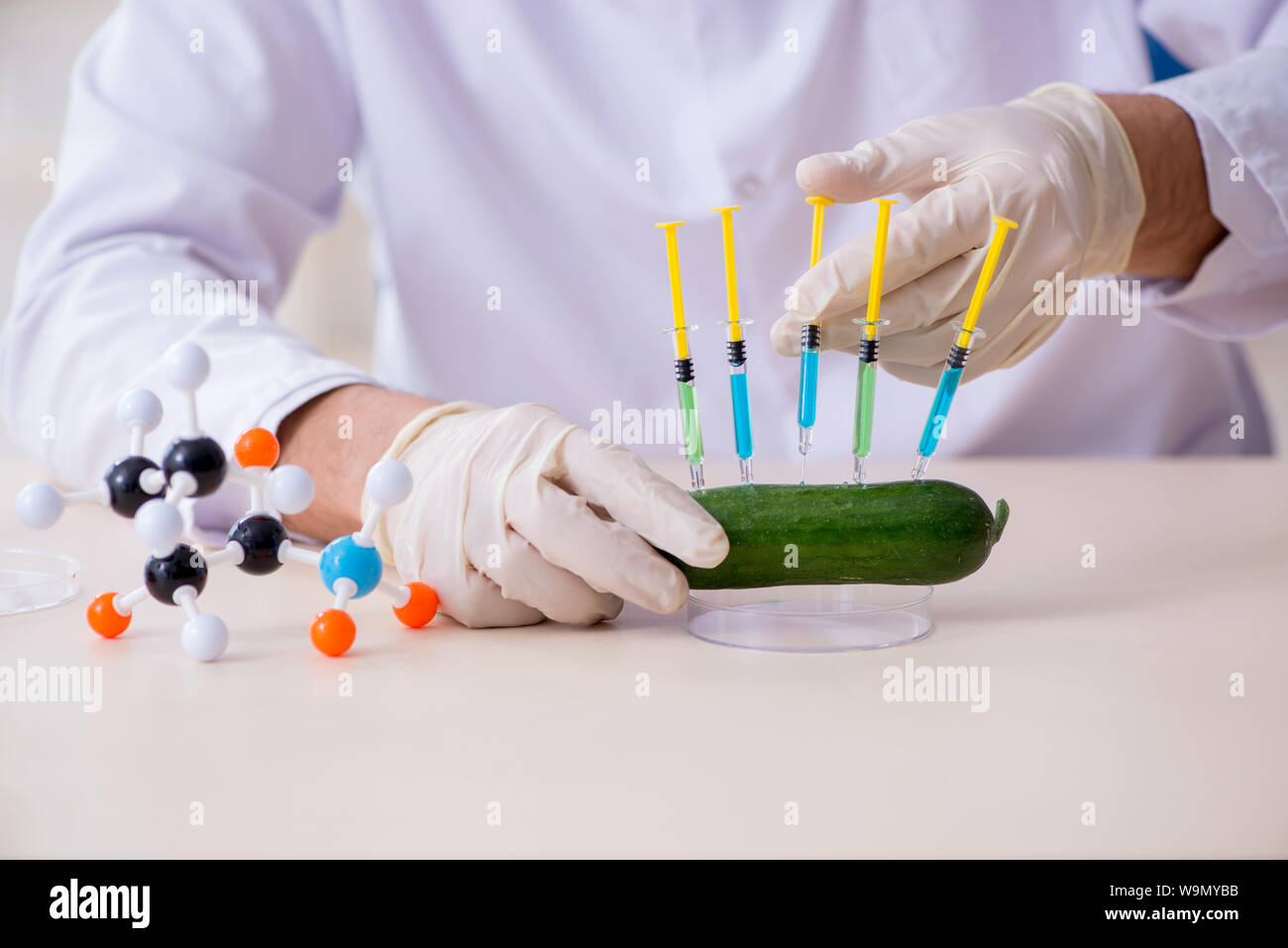 The male nutrition expert testing food products in lab Stock Photo - Alamy