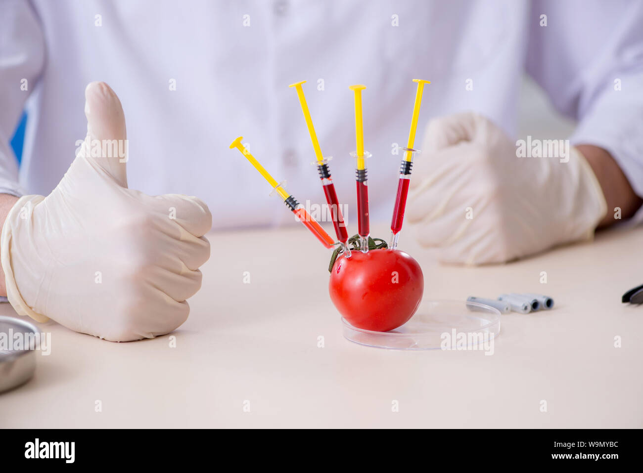 The male nutrition expert testing food products in lab Stock Photo - Alamy