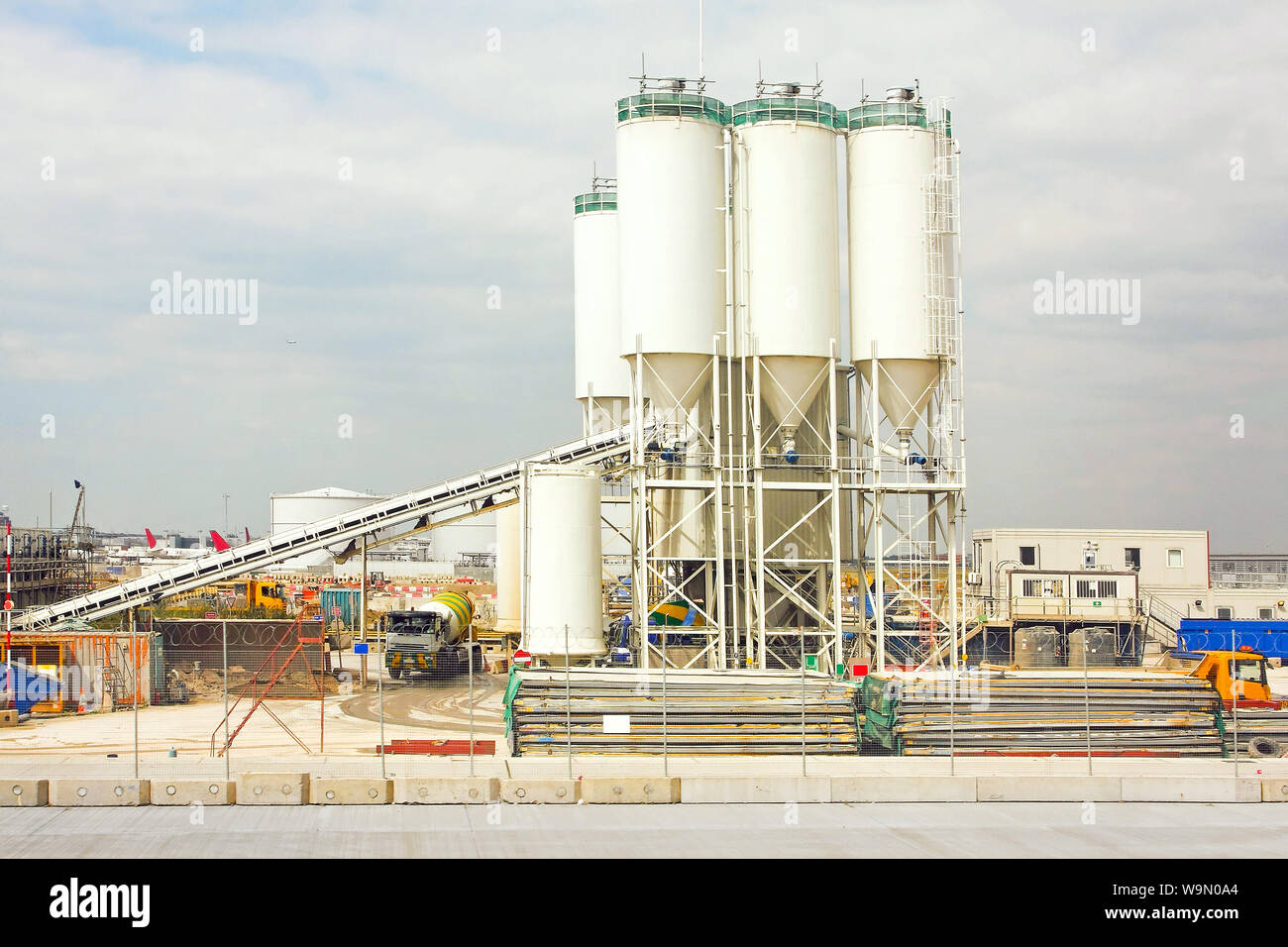 Construction site plant with cement reservoir tower Stock Photo - Alamy