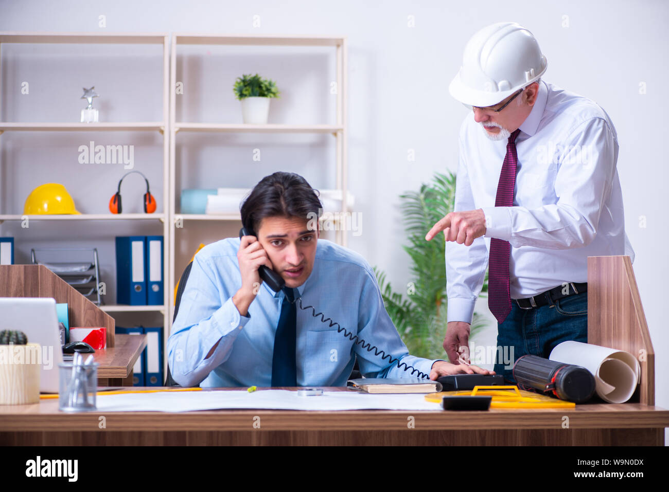 The two architects working on the project Stock Photo - Alamy