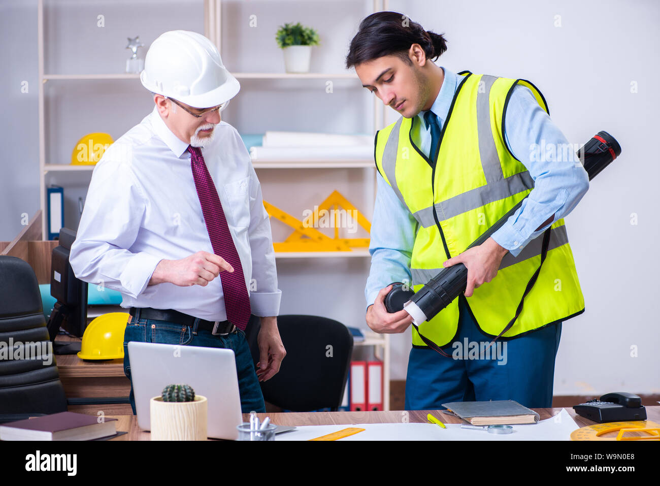 The two architects working on the project Stock Photo - Alamy
