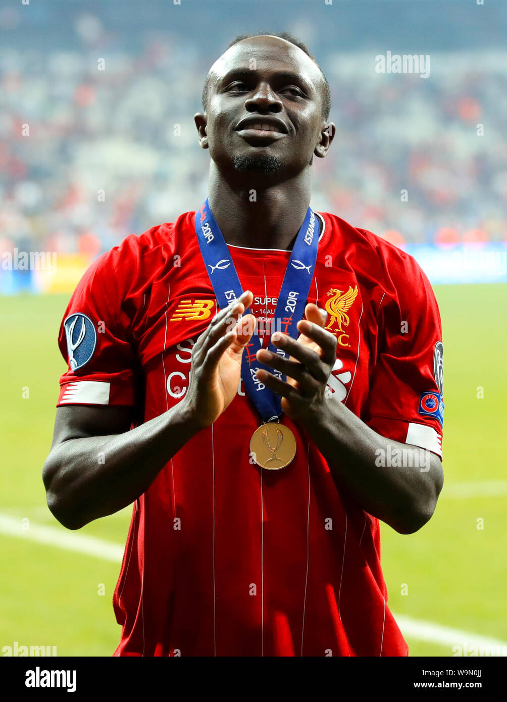 Liverpool's Sadio Mane celebrates on the pitch after his side win the ...