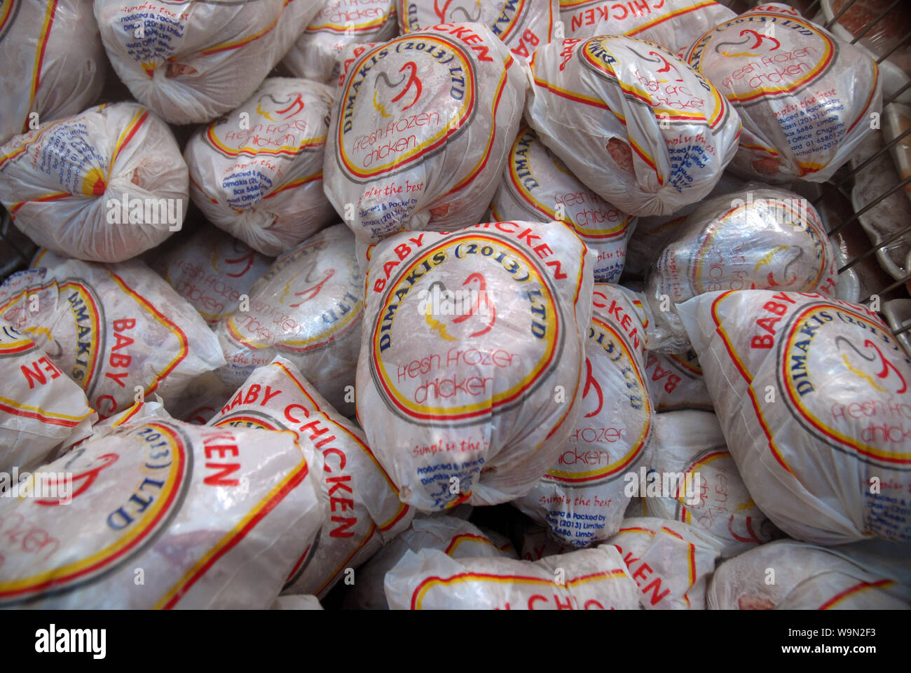 Packets of frozen chicken in supermarket freezer, Lilongwe, Malawi ...