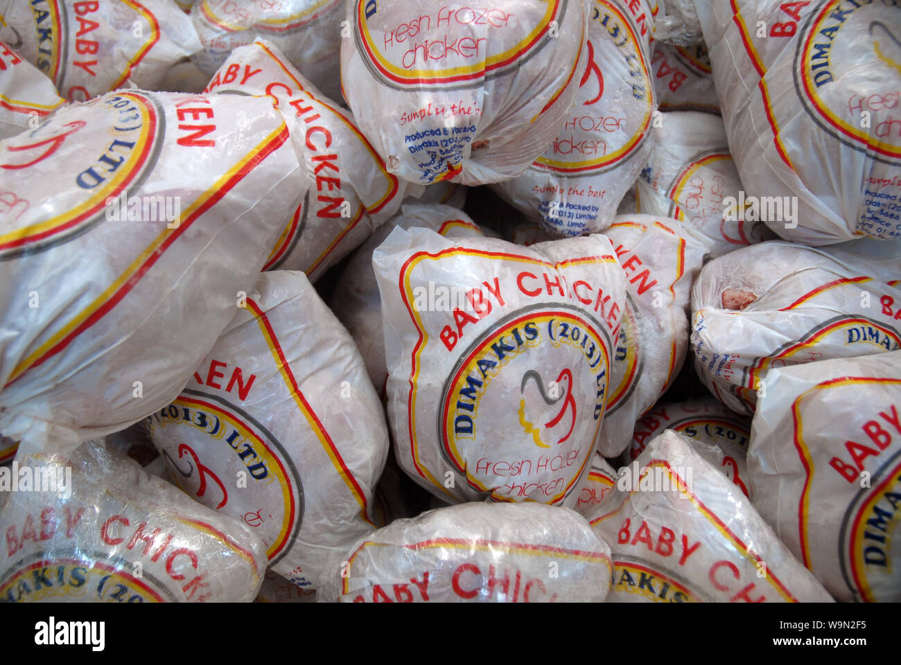 Packets of frozen chicken in supermarket freezer, Lilongwe, Malawi ...
