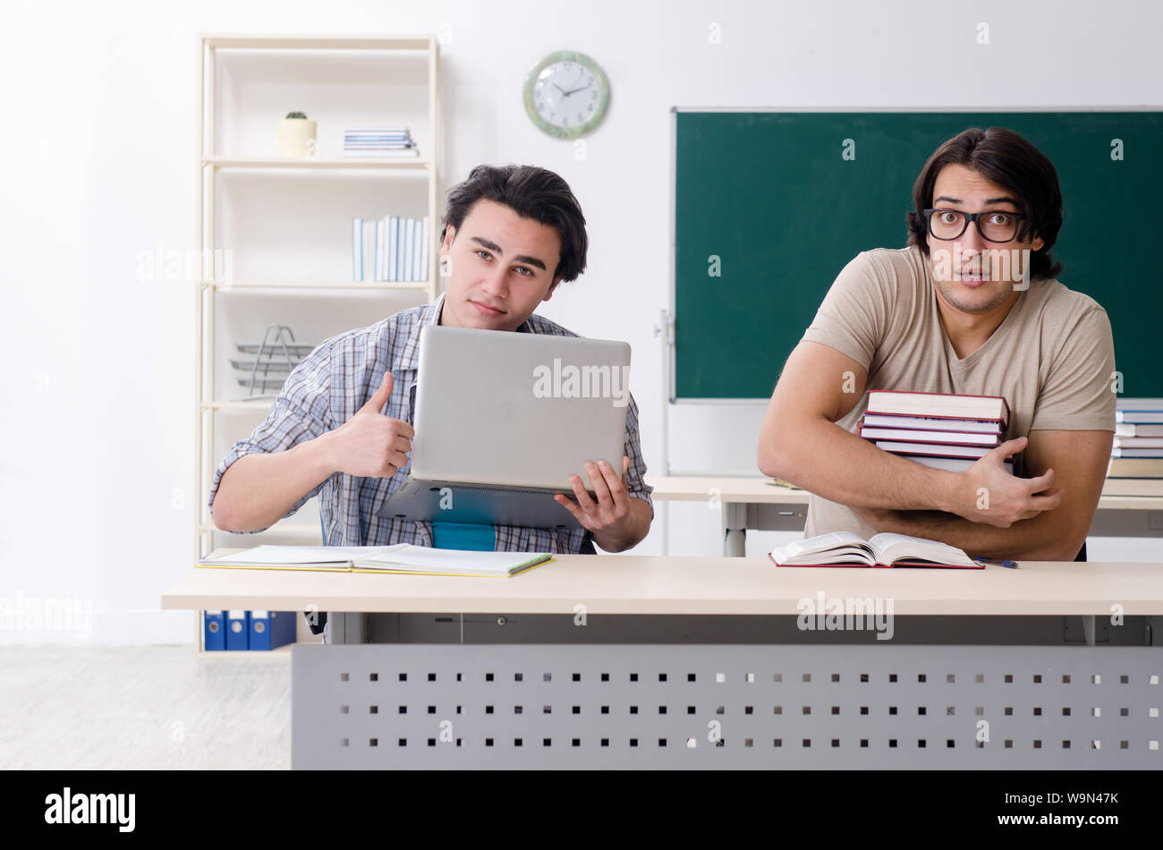 The two male students in the classroom Stock Photo - Alamy