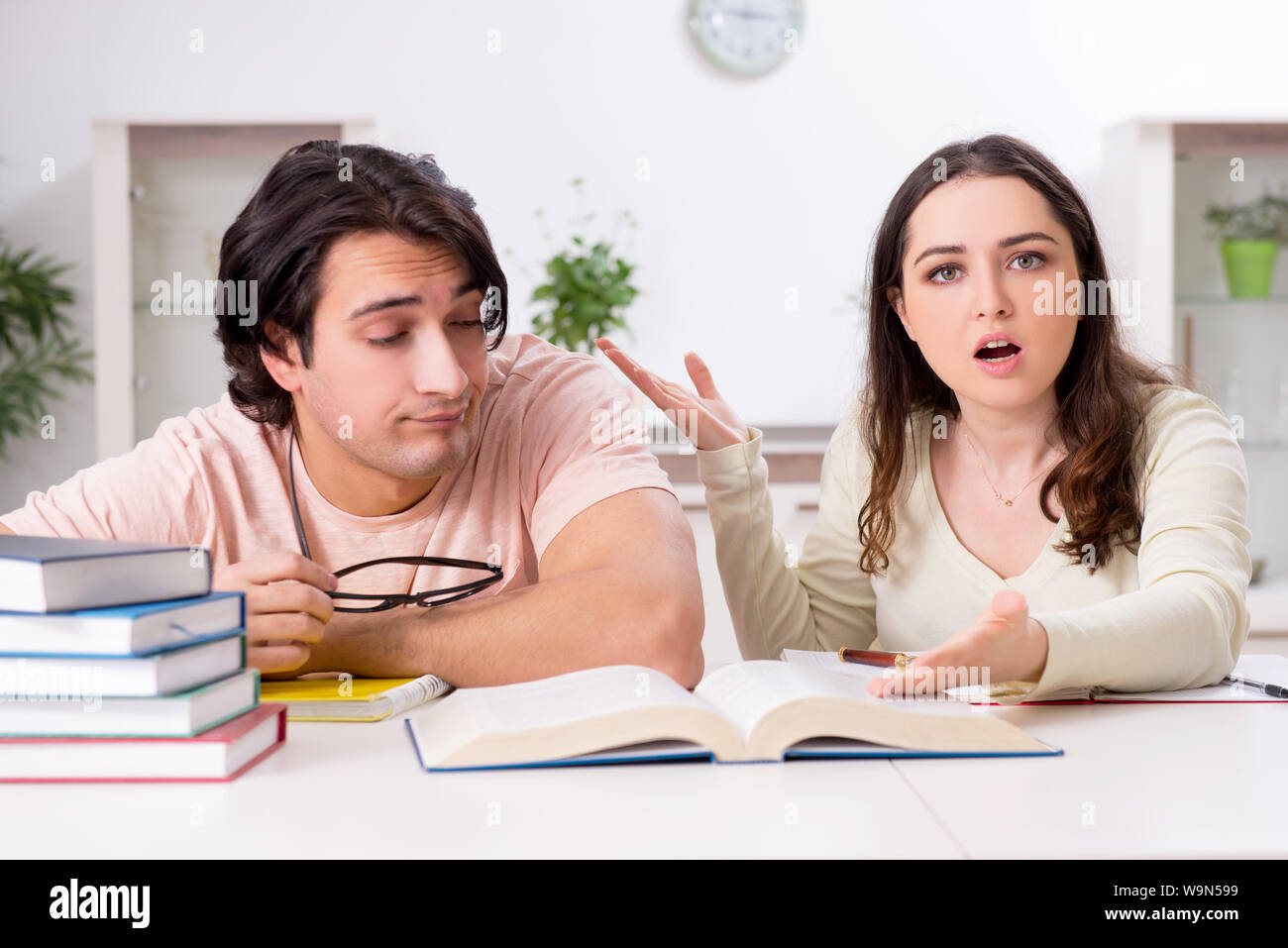 The students preparing for exam together at home Stock Photo - Alamy