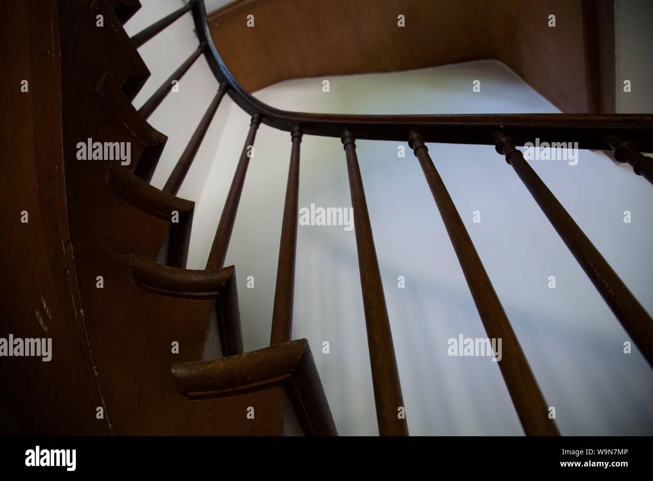 Staircase: the underside of an old oak staircase in a French château in ...