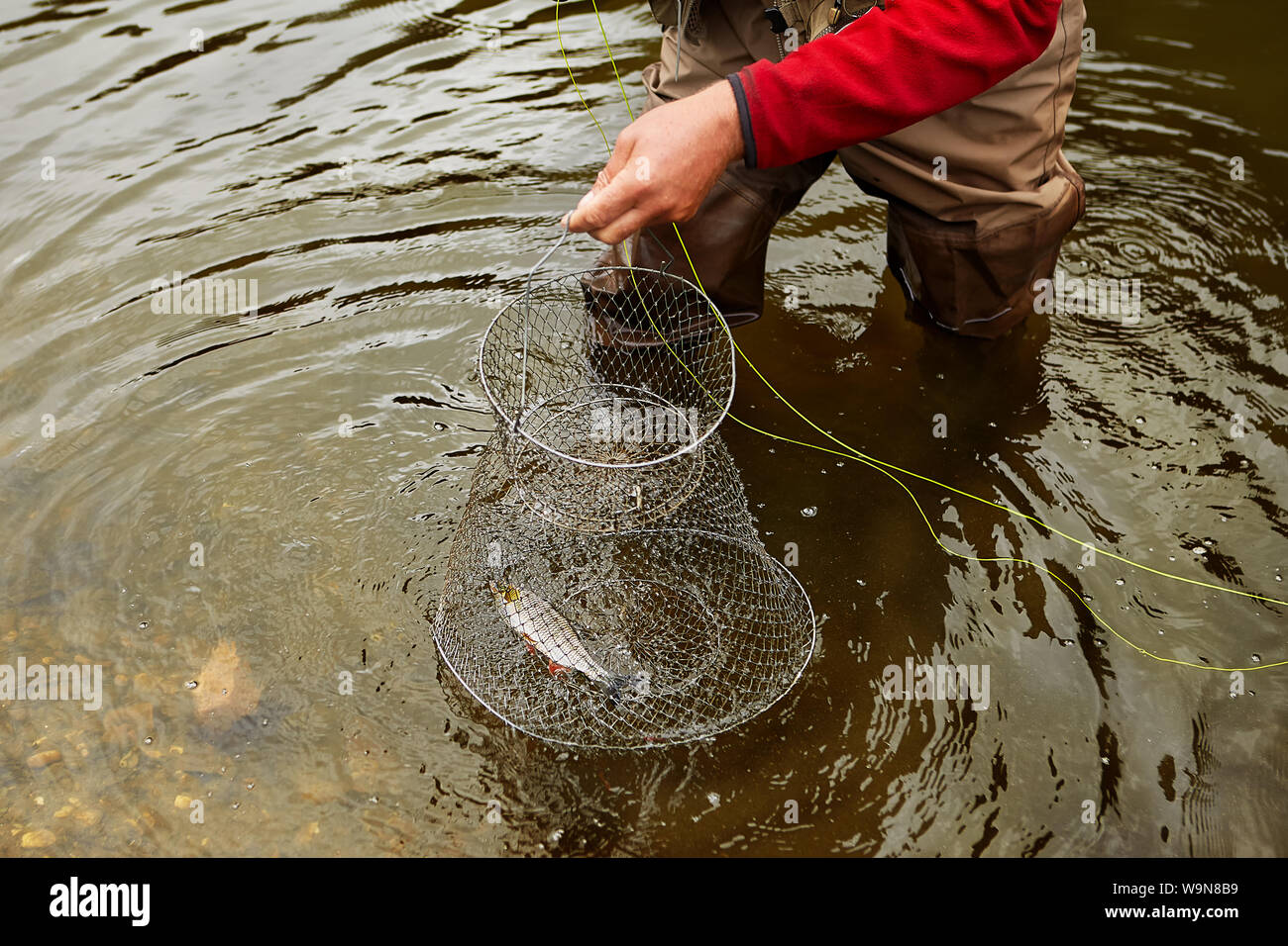 Cage fishing hi-res stock photography and images - Alamy