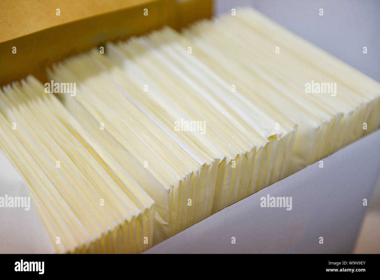 Package envelope in the box / document paper sort in document storage ...