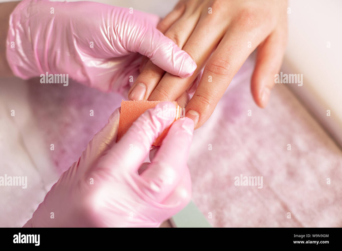 Close-up Of A Manicurist Filing Person's Nails In Salon Stock Photo - Alamy
