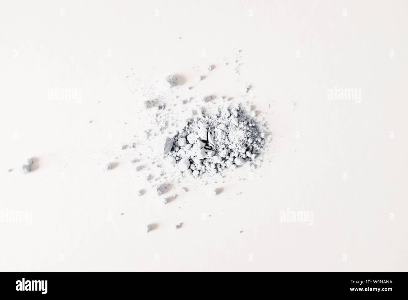 Closeup shot of gray sandy powder on a white background Stock Photo - Alamy