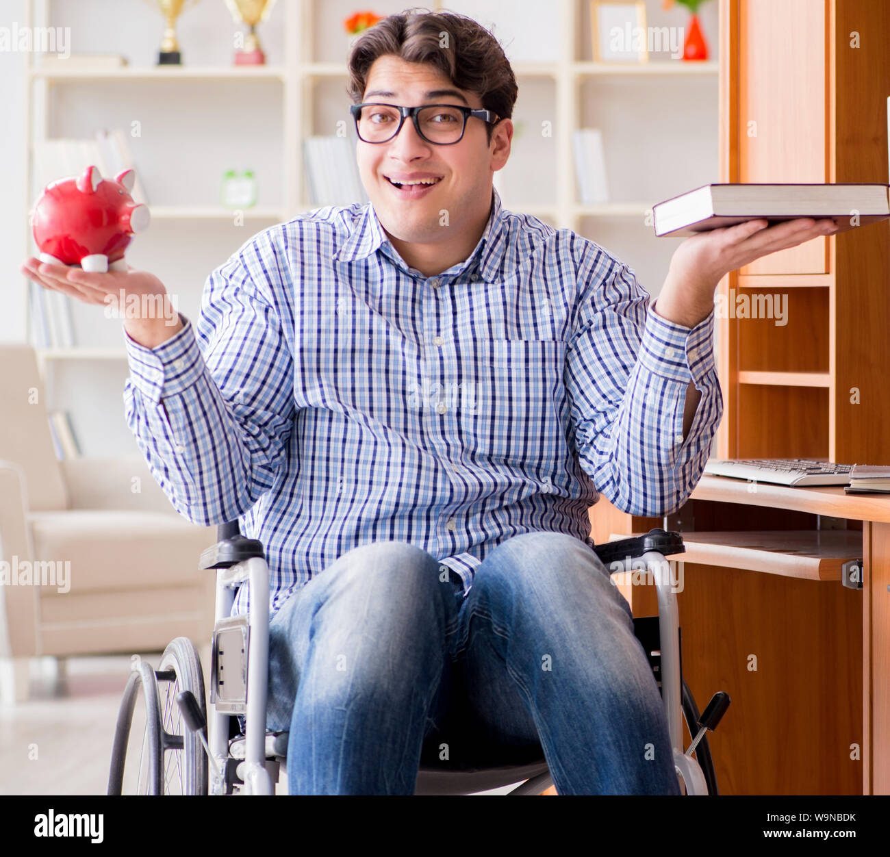 The disabled student studying at home on wheelchair Stock Photo - Alamy