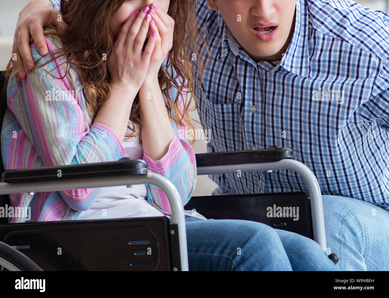The desperate disabled person on wheelchair Stock Photo - Alamy