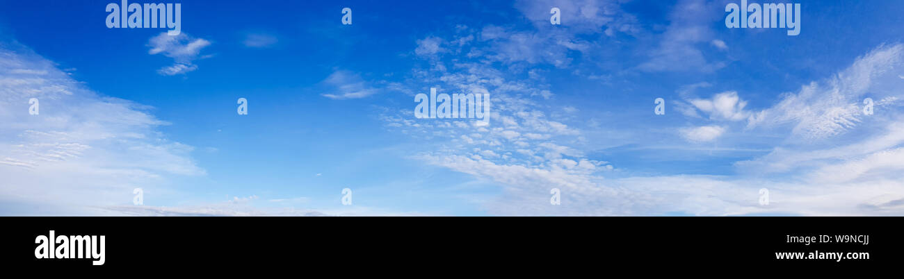 Panorama of clear blue sky with white cloud background. Clearing day ...
