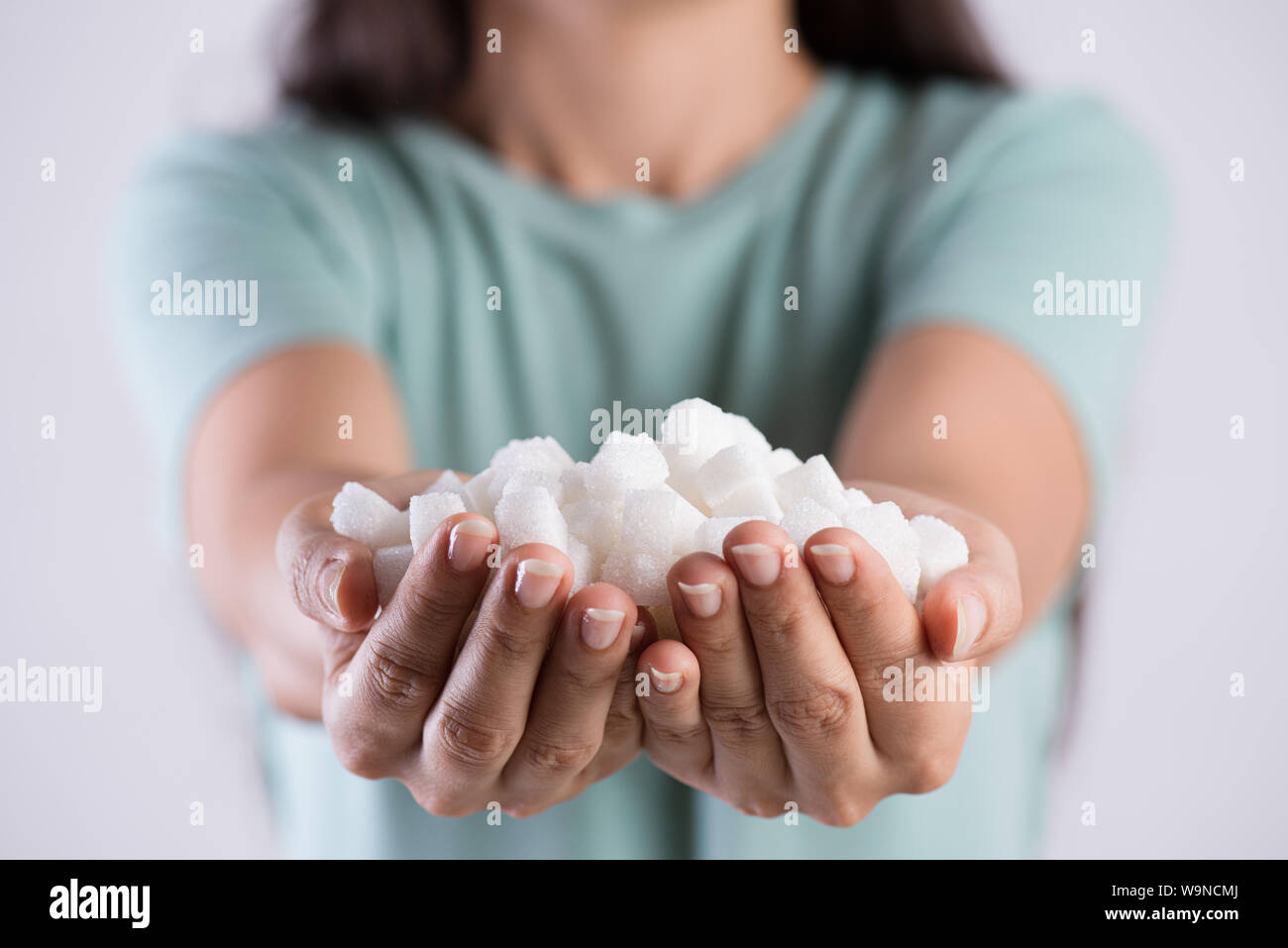 Woman Eating Sugar Cube High Resolution Stock Photography and Images ...