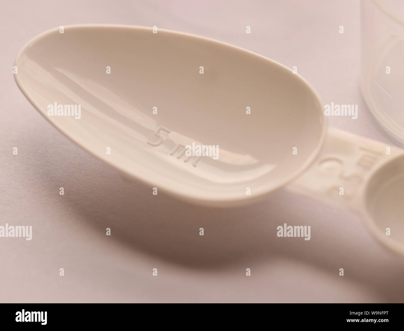 Spoon with medicine hi-res stock photography and images - Alamy