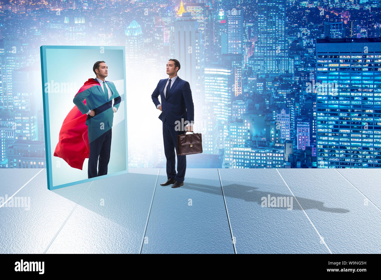 The businessman seeing himself in mirror as superhero Stock Photo - Alamy
