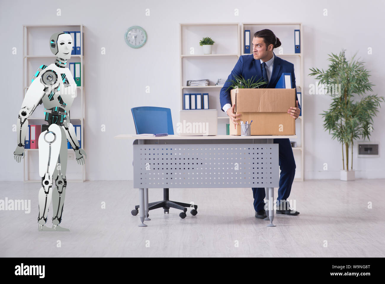 The concept of robots replacing humans in offices Stock Photo - Alamy