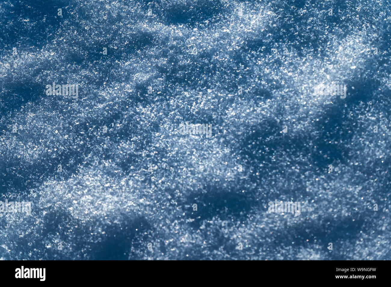 monochrome background , texture of blue shiny snow closeup Stock Photo ...