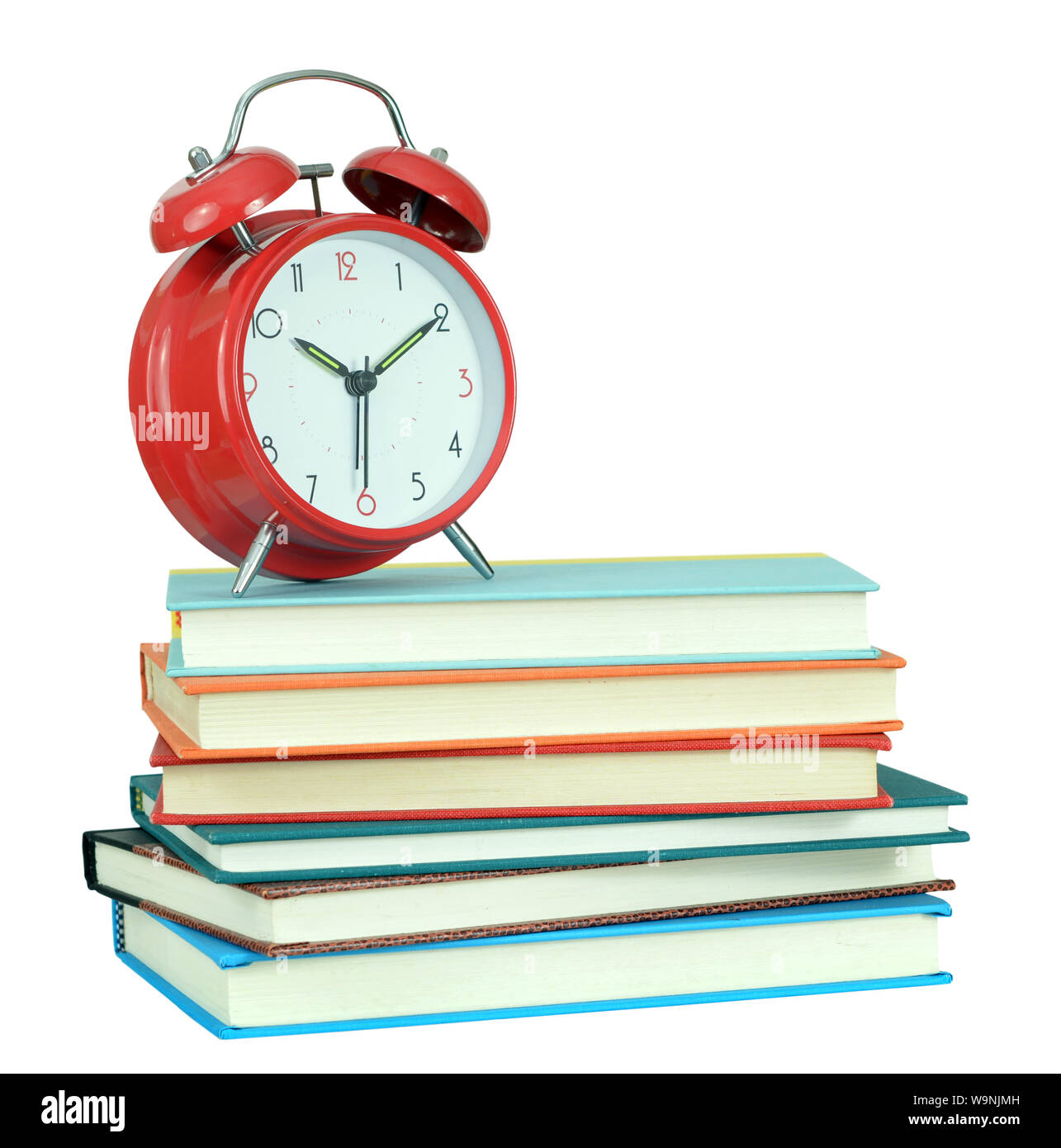 vintage clock on the top of stack of book Stock Photo - Alamy