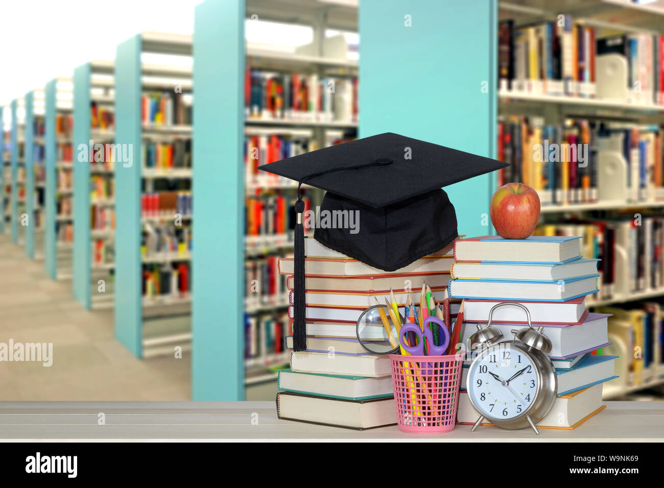 blurry background of library with book and accessory for education ...