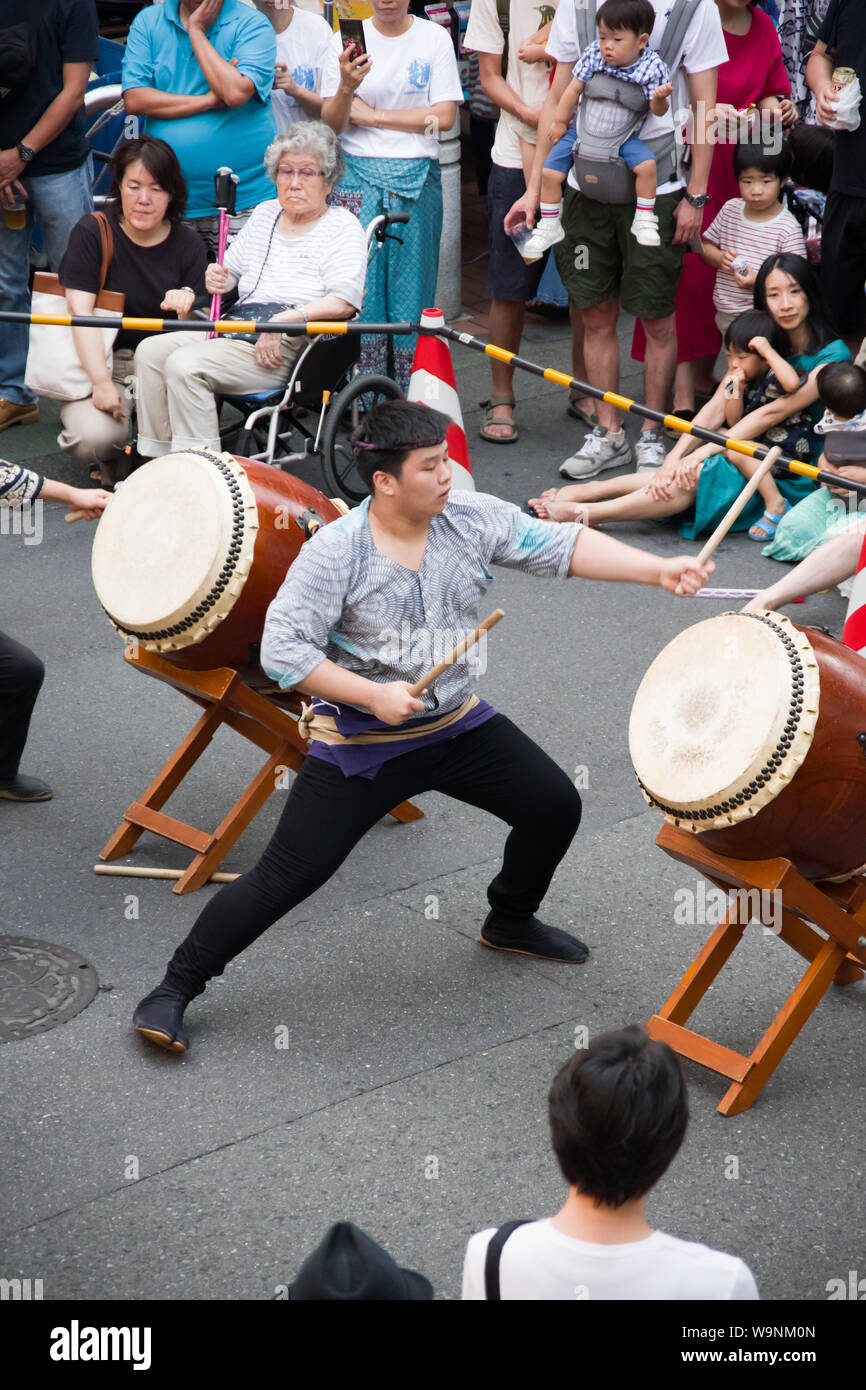 Tamachi, Tokyo, Japan, 07/27/2019 , Taiko drummers performing in front ...