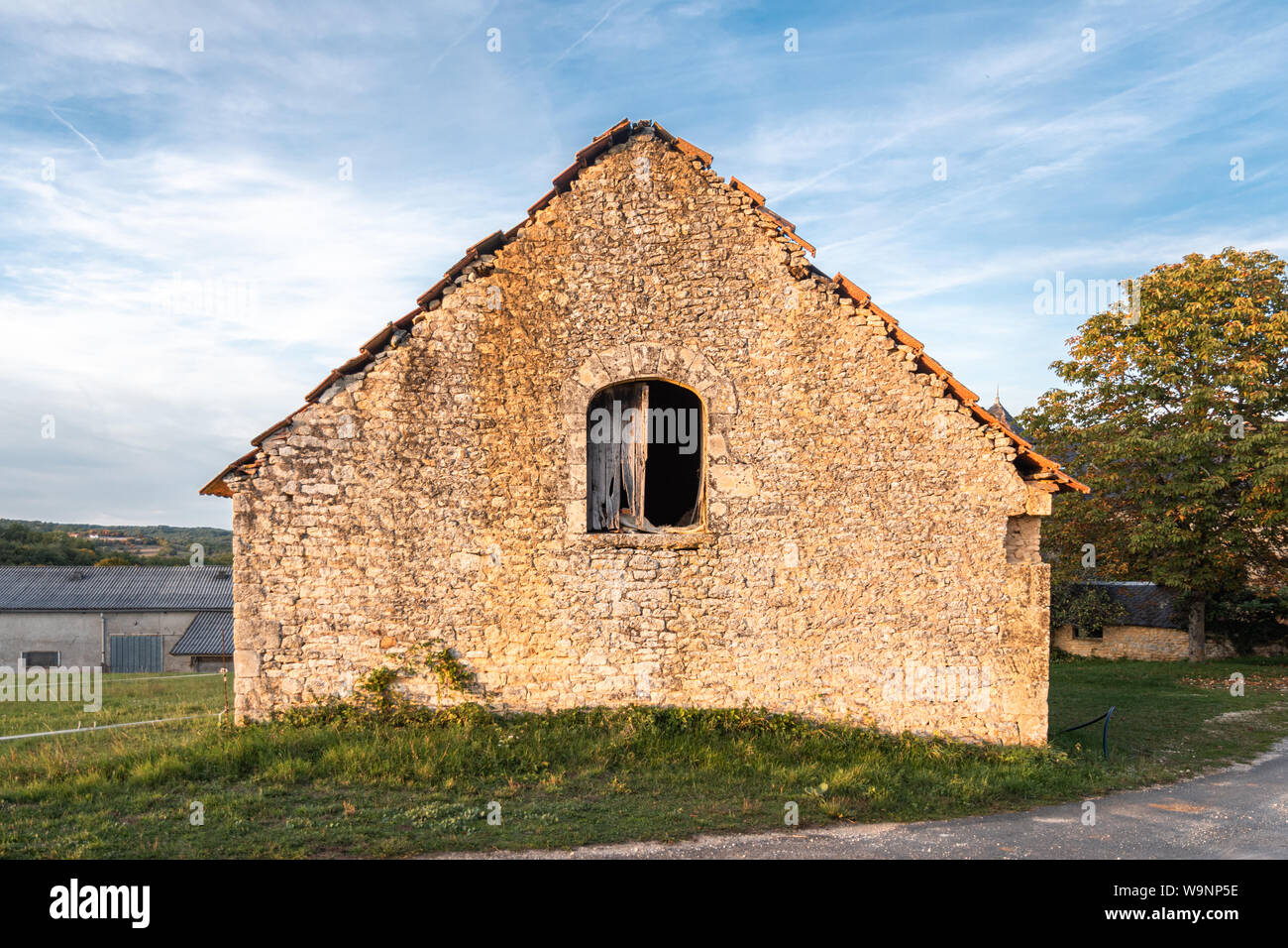An old French farm house symmetrical in middle of frame Stock Photo - Alamy
