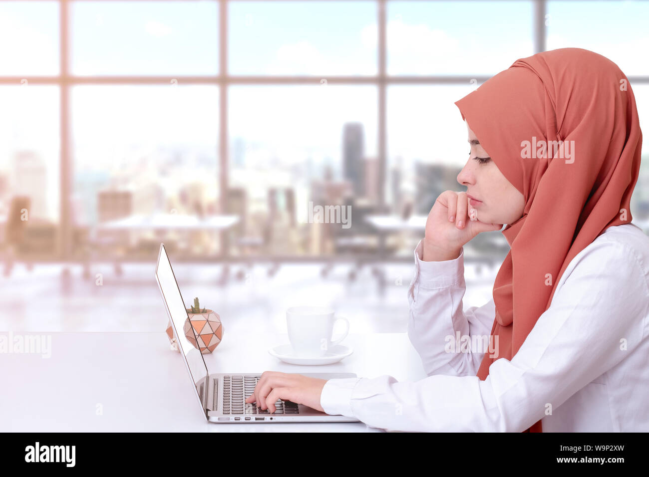 Hijab muslim woman work with computer, muslim girl sitting in office ...