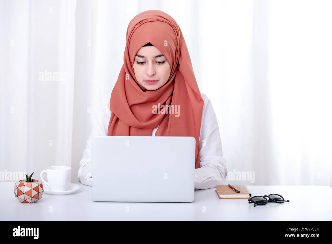 Hijab muslim woman work with computer, muslim girl sitting in office ...