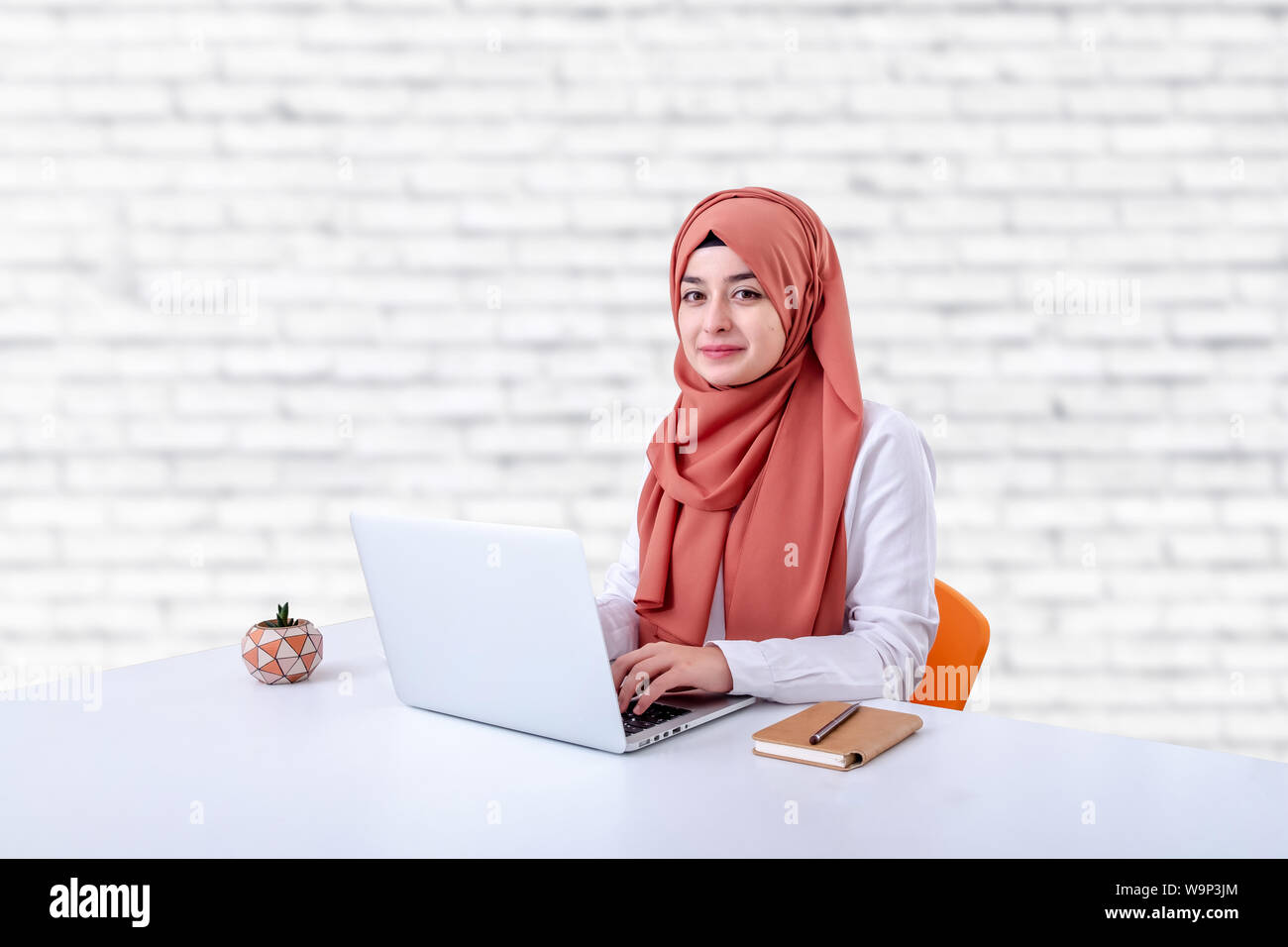 Hijab muslim woman work with computer, muslim girl sitting in office ...
