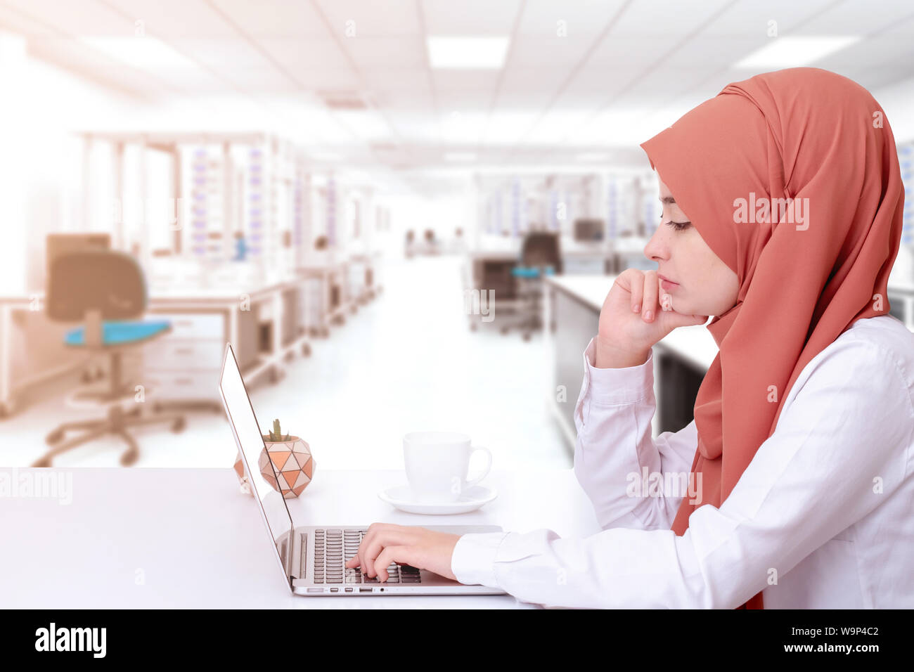Hijab muslim woman work with computer, muslim girl sitting in office ...