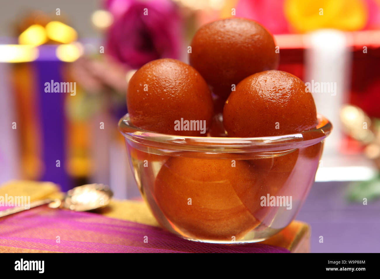 Bowl of gulab jamun on a gift box Stock Photo - Alamy
