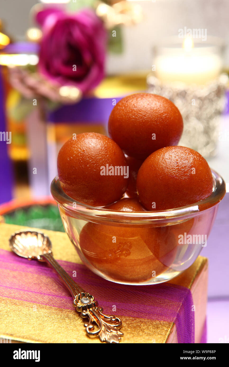 Bowl of gulab jamun on a gift box Stock Photo - Alamy