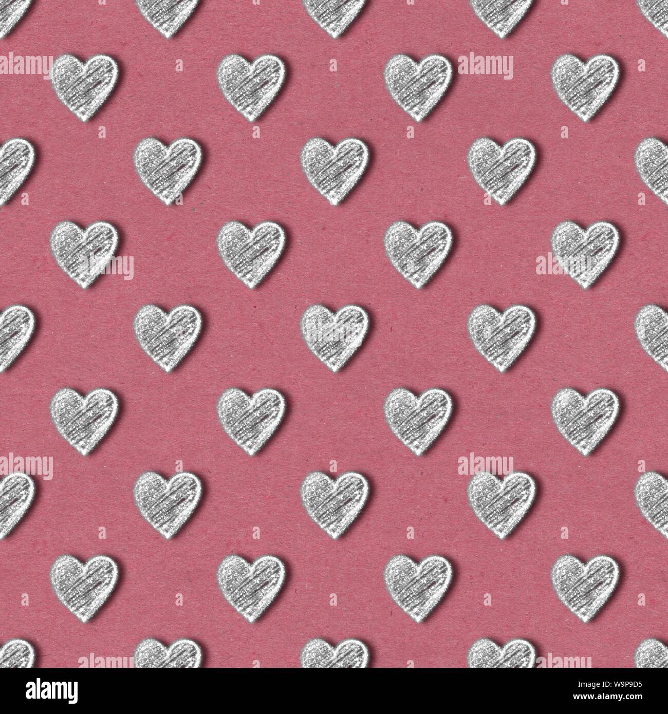 Silver hearts seamless pattern on old paper background Stock Photo - Alamy