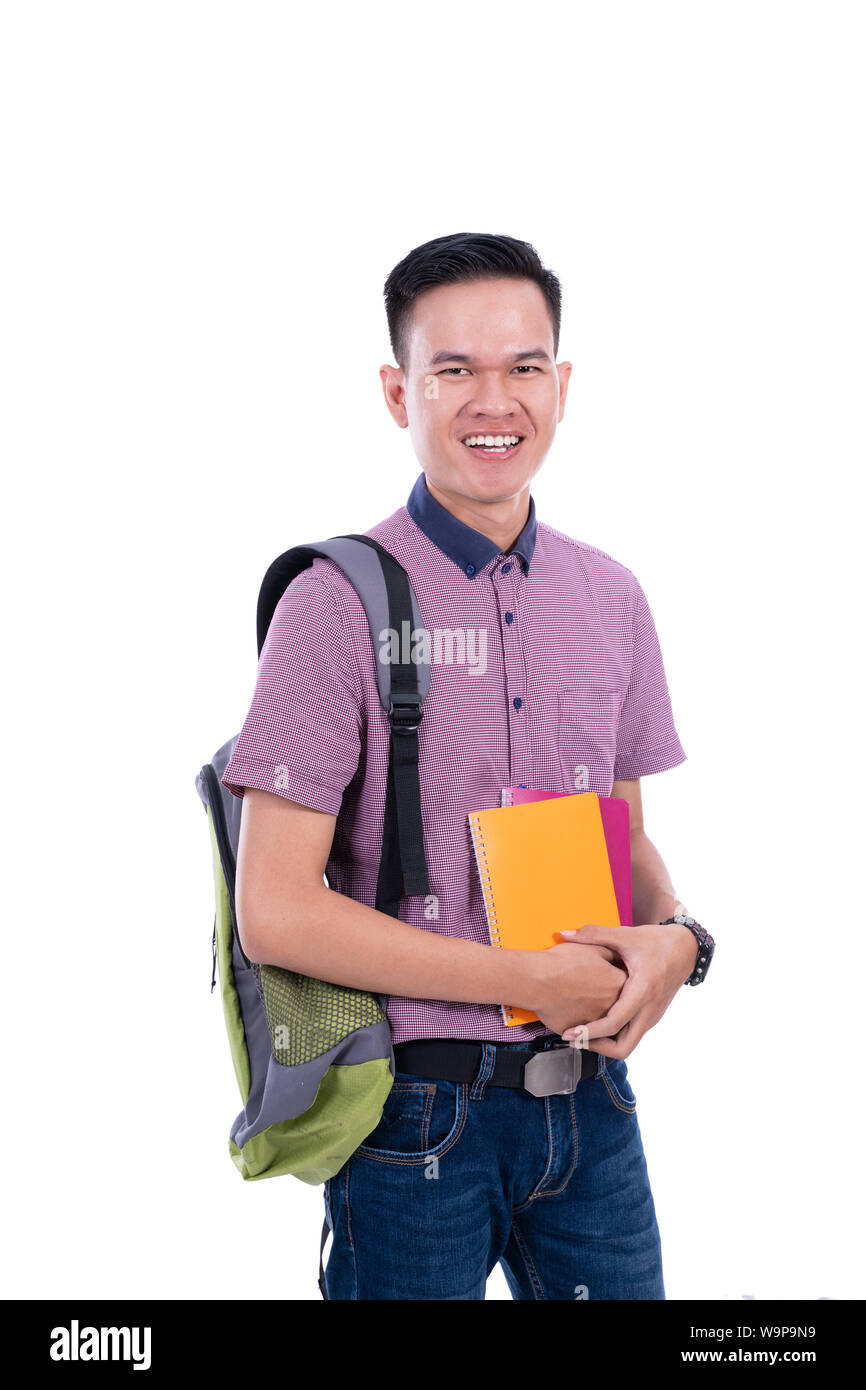 College student holding book Stock Photo - Alamy