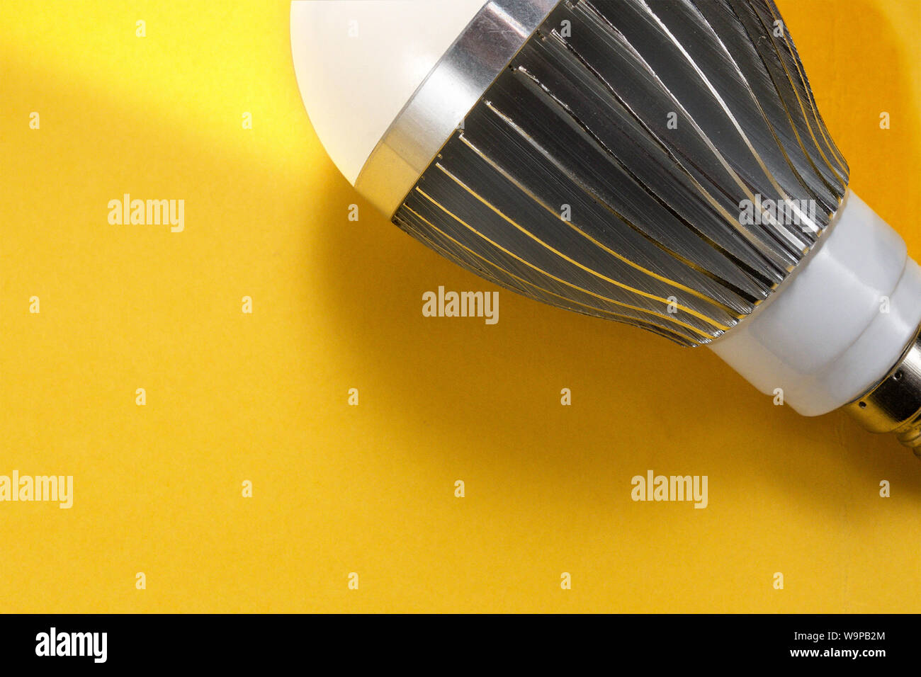 Powerful LED bulb lamp with cooling radiator closeup image. Concept ...