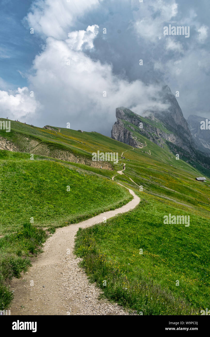 The hiking trail along the top of Seceda mountain in the Italian ...