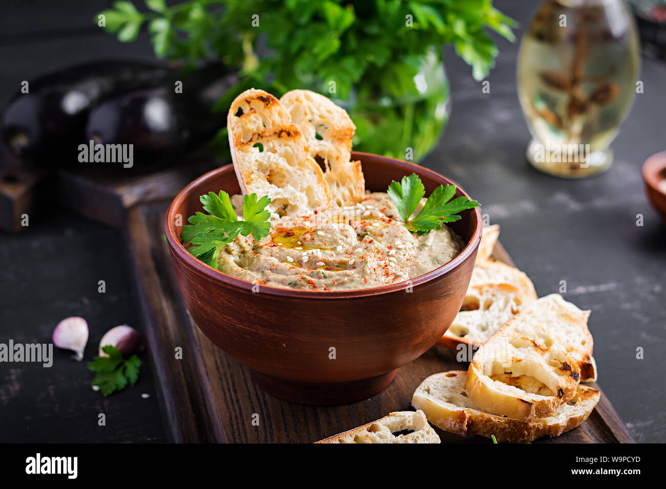 Baba ghanoush vegan hummus from eggplant with seasoning, parsley and ...