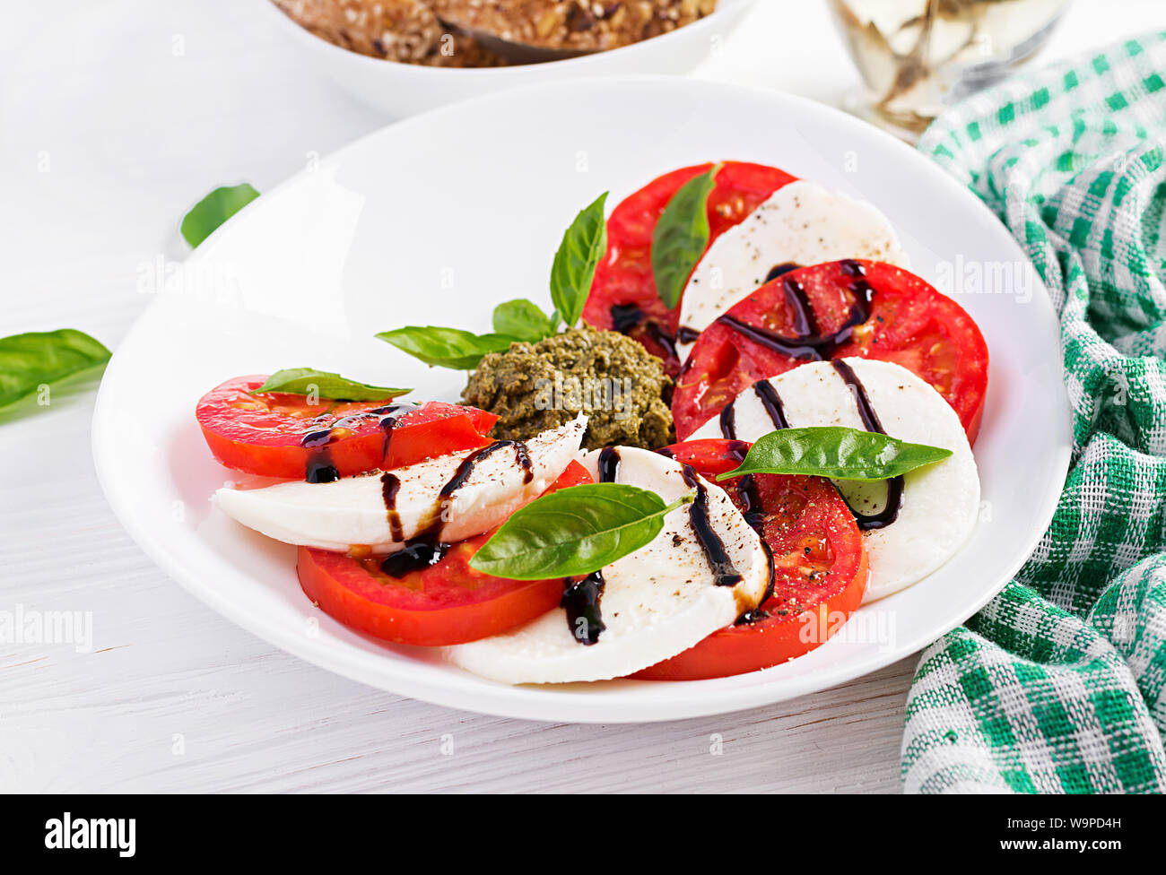 Traditional Italian Caprese Salad with mozzarella, tomato, basil and ...